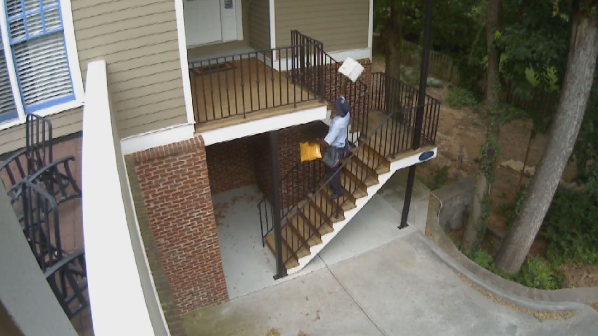 Video shows Atlanta mail carrier throwing fragile package onto home's ...