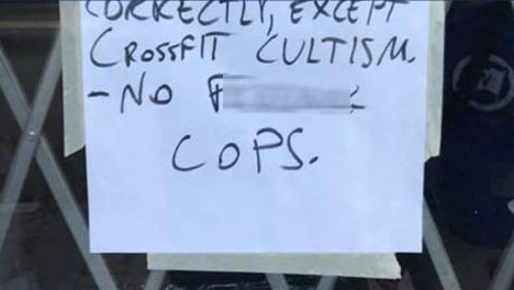 Gym owner makes no apologies for 'No Cops' sign | 9news.com