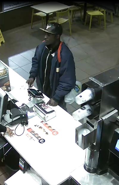 Man sought by police after surveillance video catches him robbing ...